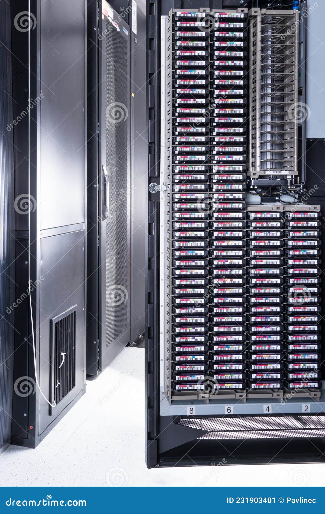 An Opened Door of Data Center Cabinet Filled with Data Storage H Stock ...