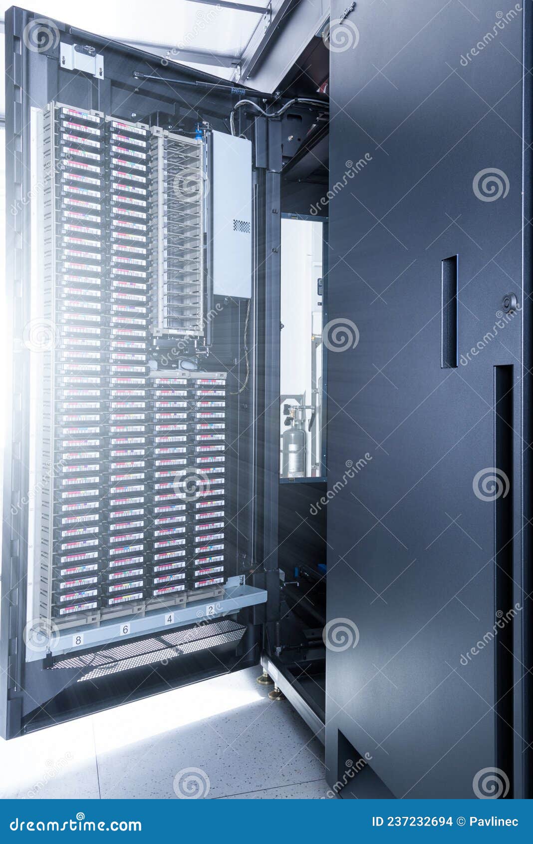 An Opened Door of Data Center Cabinet Filled with Data Storage H Stock ...