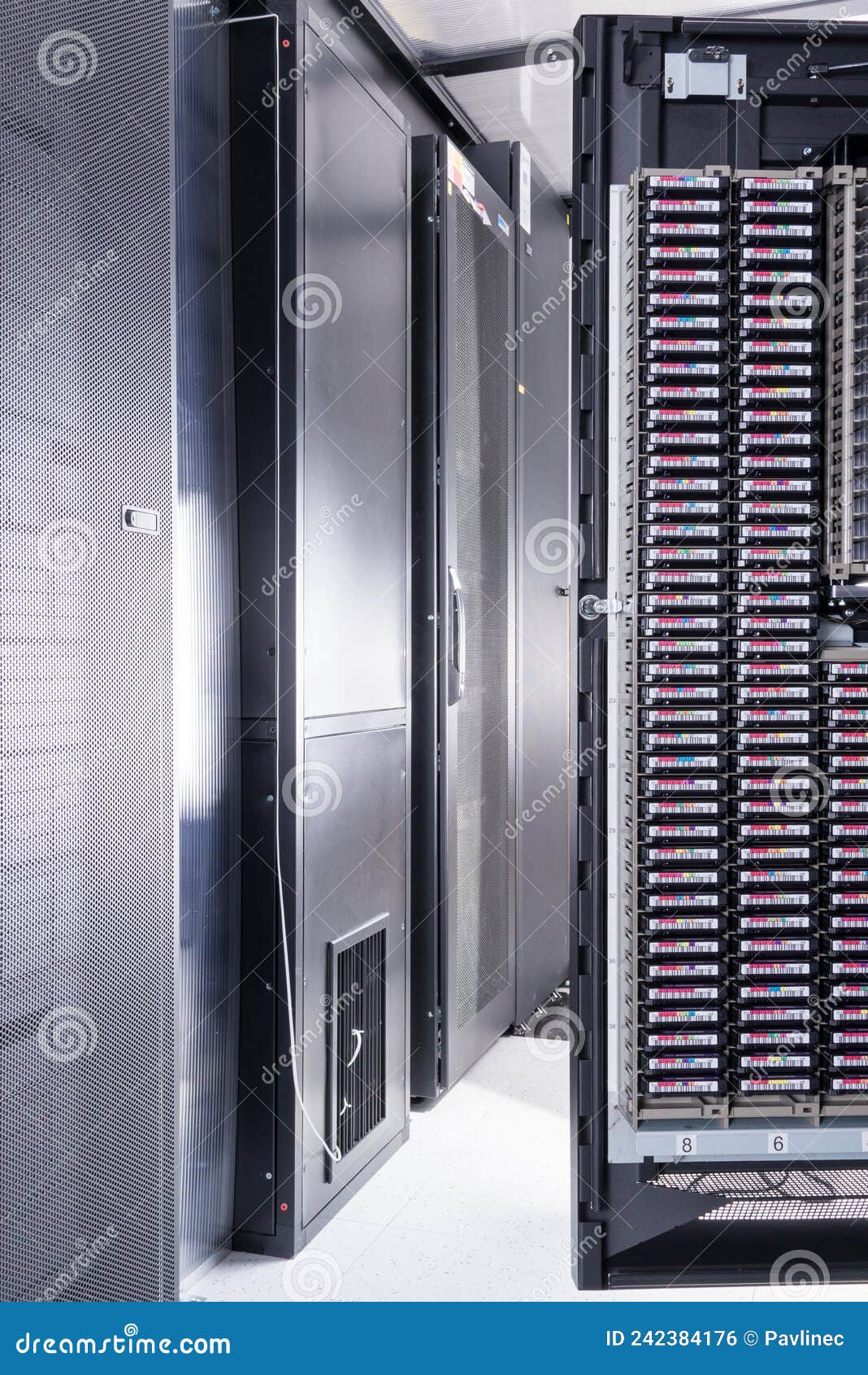 An Opened Door of Data Center Cabinet Filled with Data Storage Hardware ...