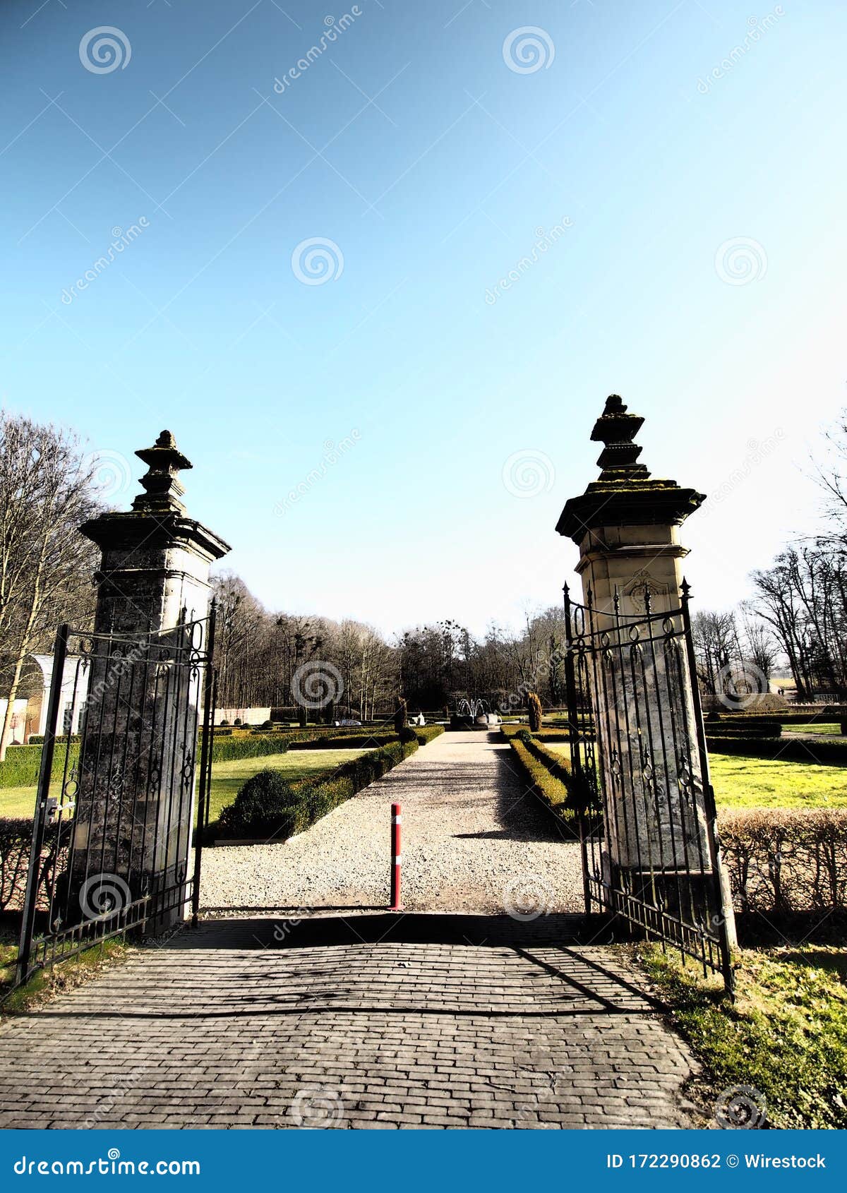 Entrance To The Park Delimited By A Passage Between Concrete Columns ...