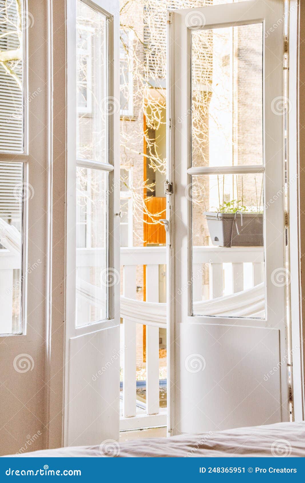 An opened glass doors stock image. Image of curtains - 248365951