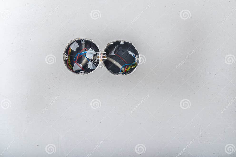 Opened Junction Box and Electrical Wire on the Old White Wall ...