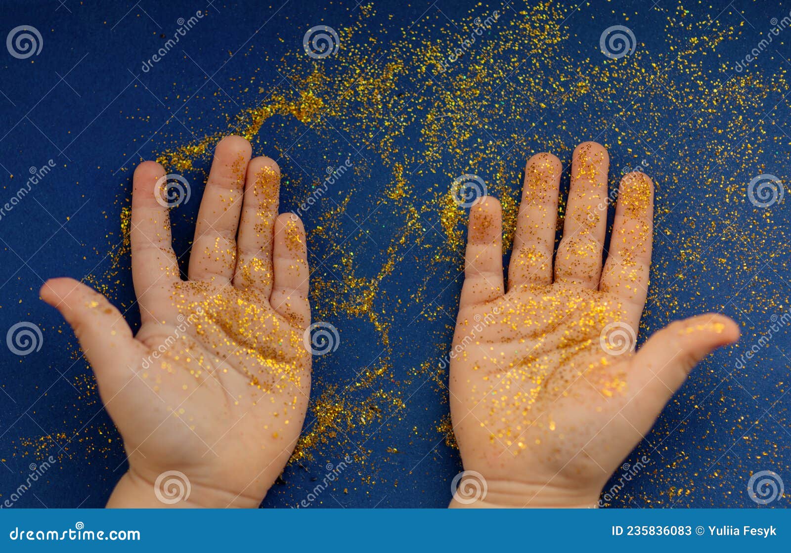 Opened Little Hands of Kid Covered by Shiny Glitter. Stock Image ...