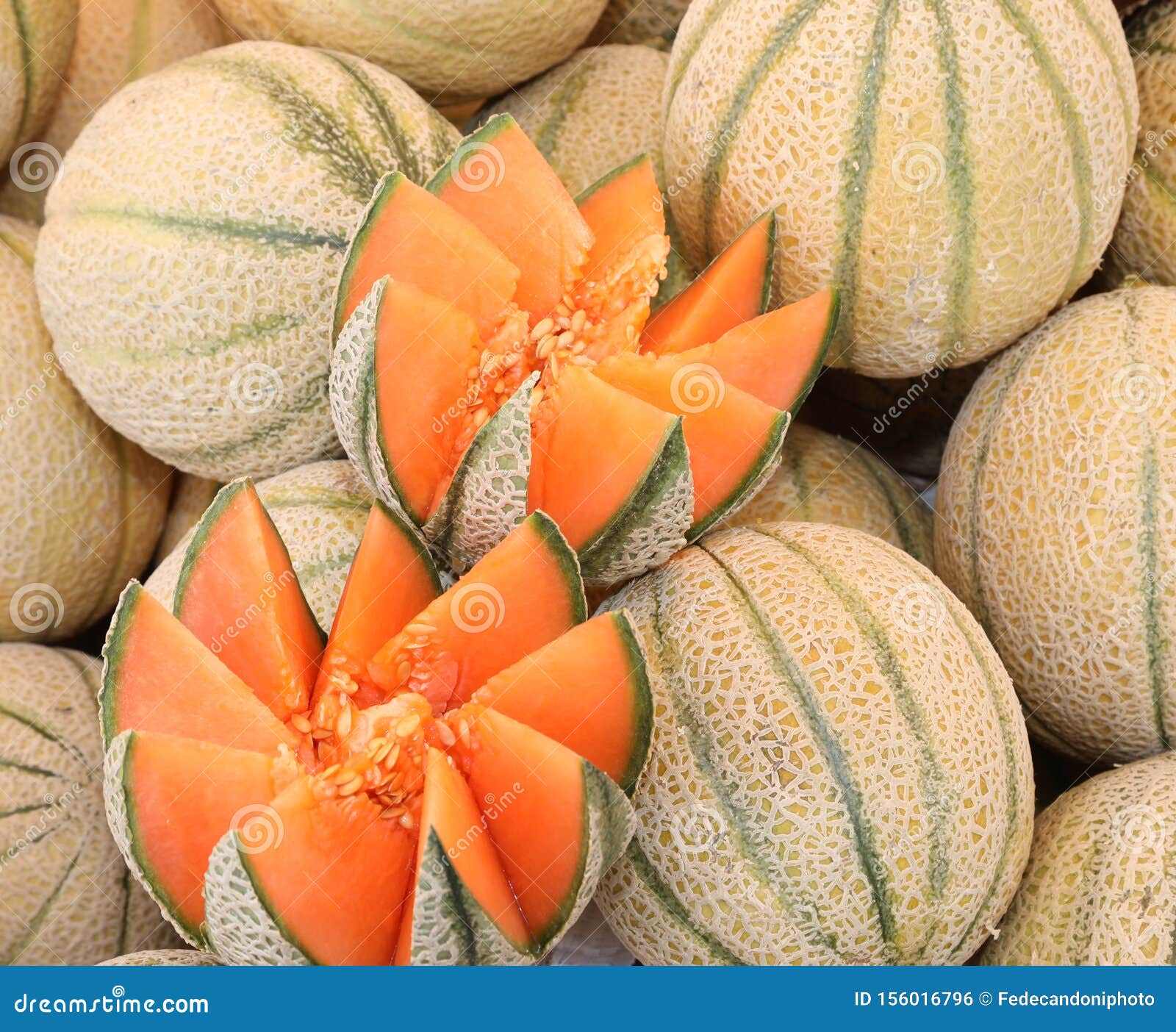 Opened Melons at market stock photo. Image of freshly - 156016796