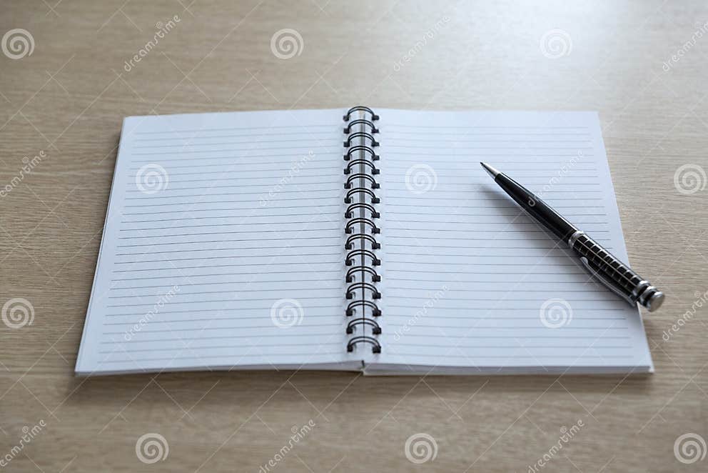 Opened Notebook with a Strip and with a Handle on a Spring on a Light ...