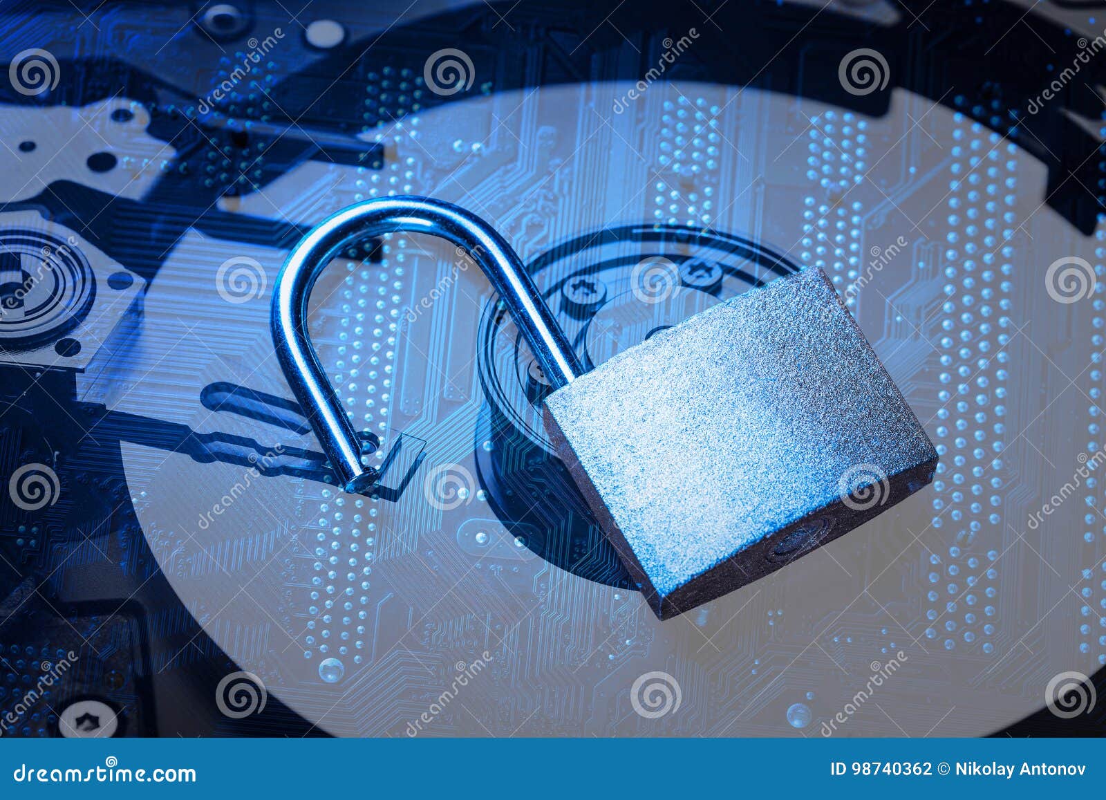 Opened Padlock on Computer Motherboard and Hard Disk Drive. Internet ...