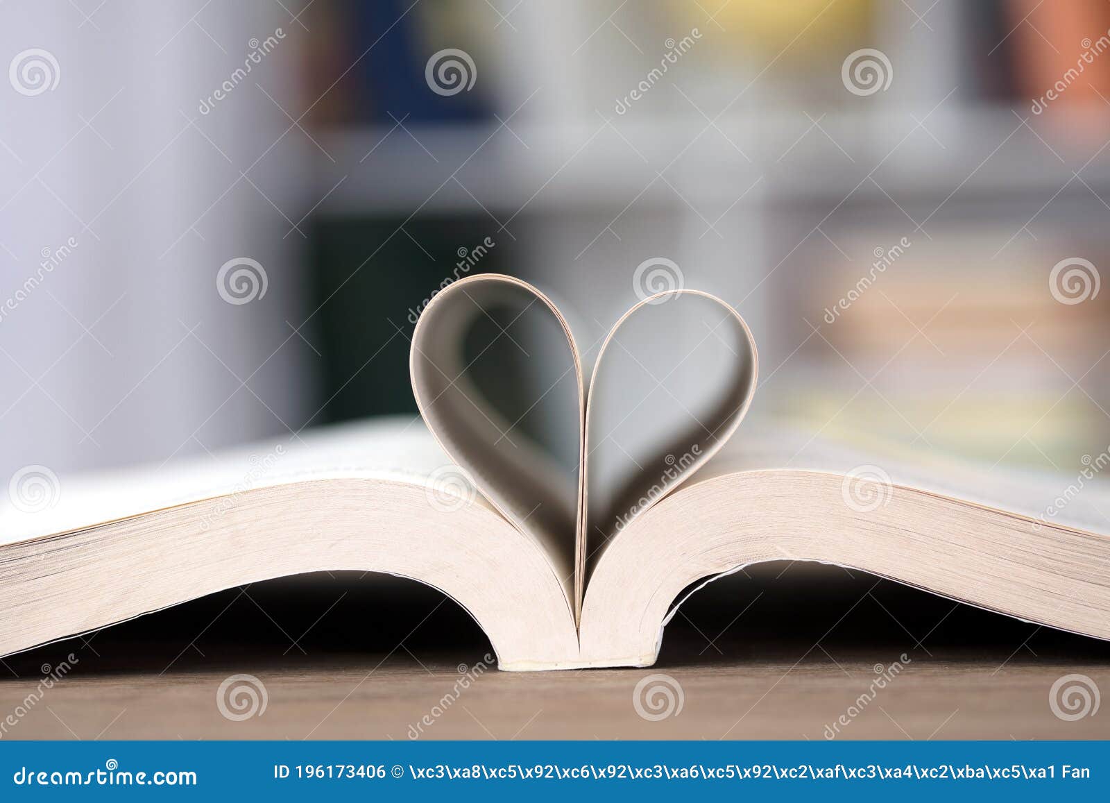The Opened Pages are Folded into a Heart Shape Stock Photo - Image of ...