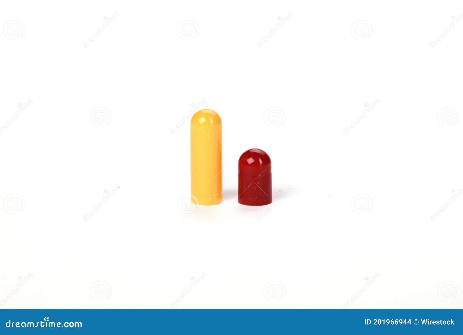 Opened Red and Yellow Capsule Isolated on a White Background Stock ...