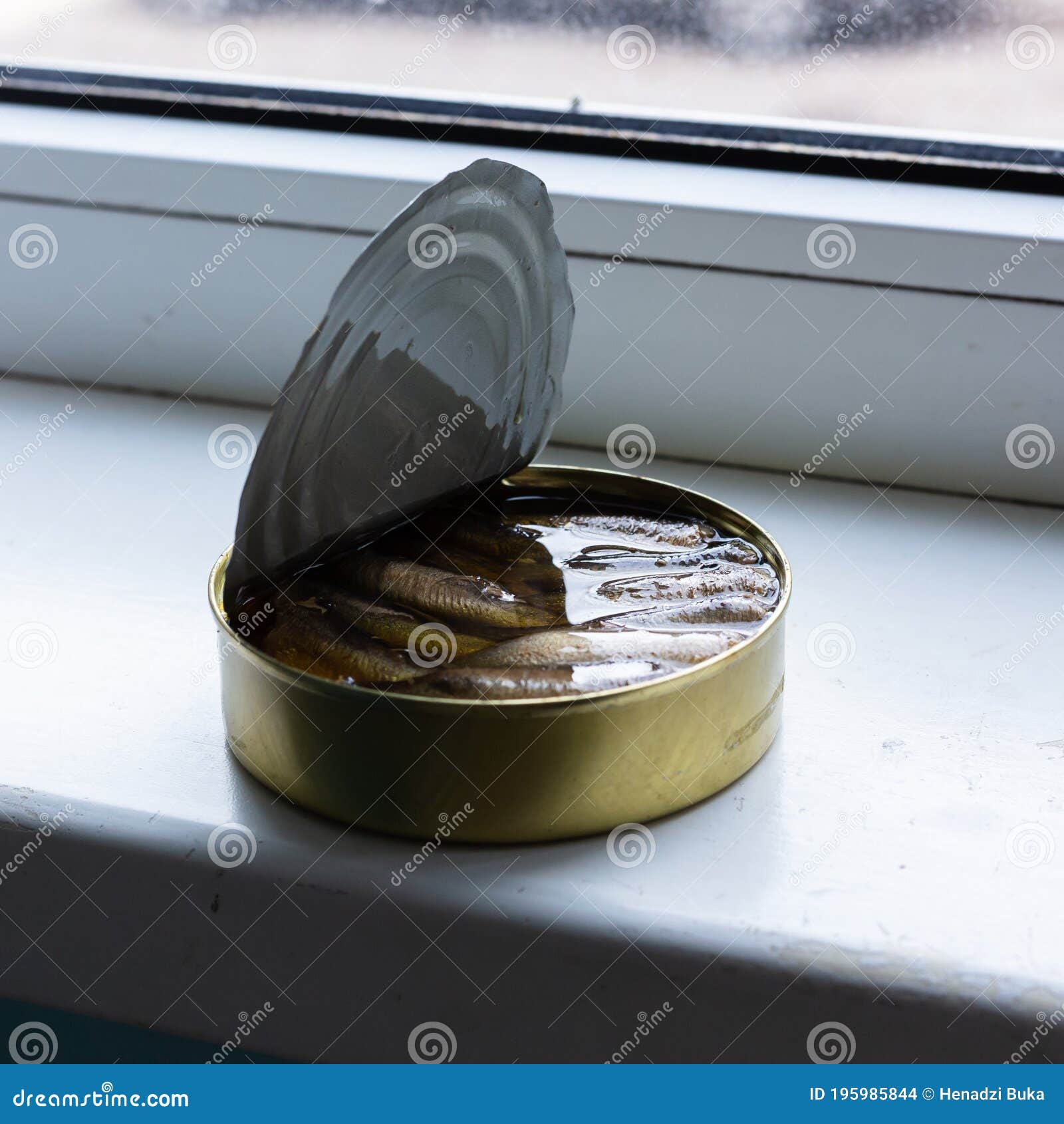 Opened tin of canned fish stock photo. Image of metal - 195985844