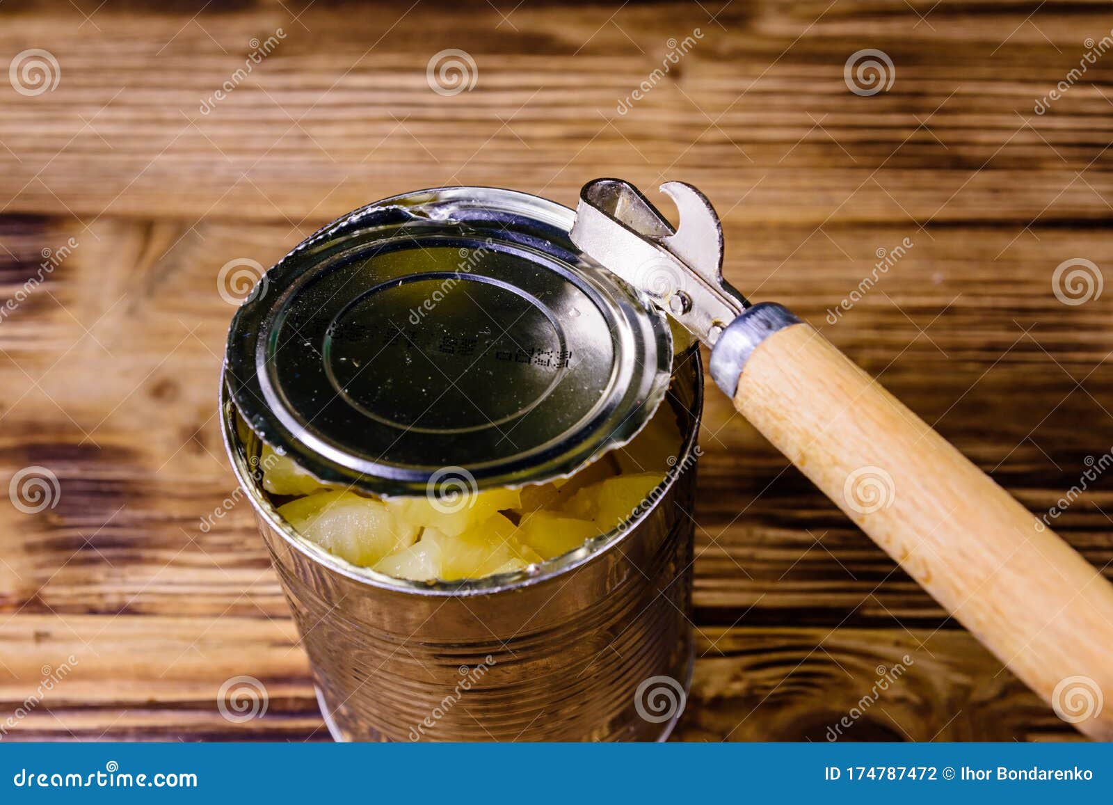 Opening of the Aluminium Tin Can with Chopped Canned Pineapple Stock ...