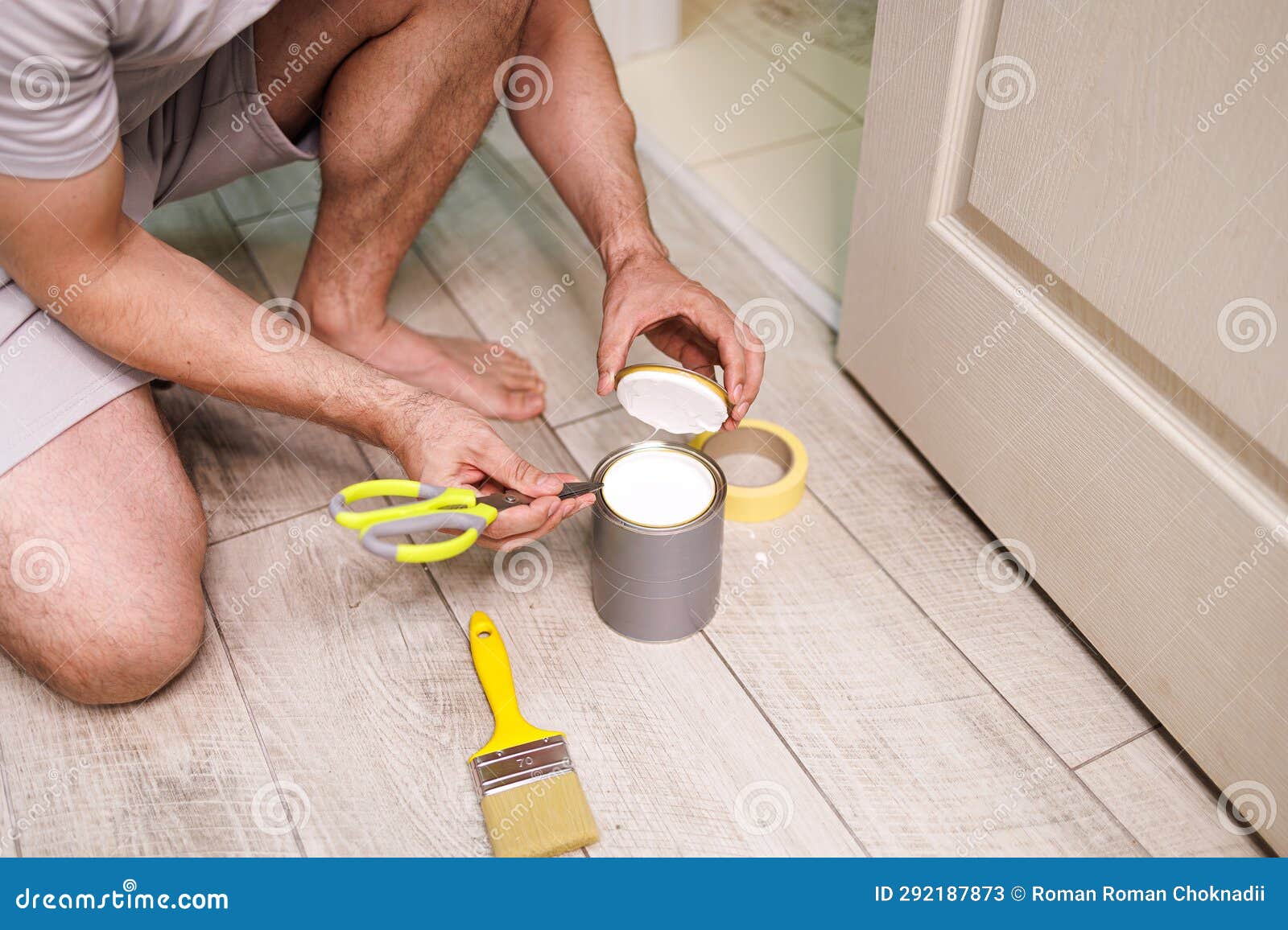 Opening a Can of Paint with a Pair of Scissors. Repair Staining the ...