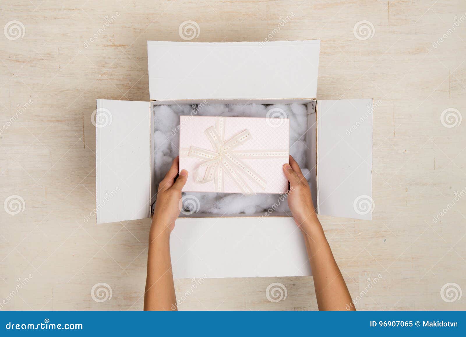 Opening a Carton Box. Hands Holding Gift Box in Cardboard Box Stock ...