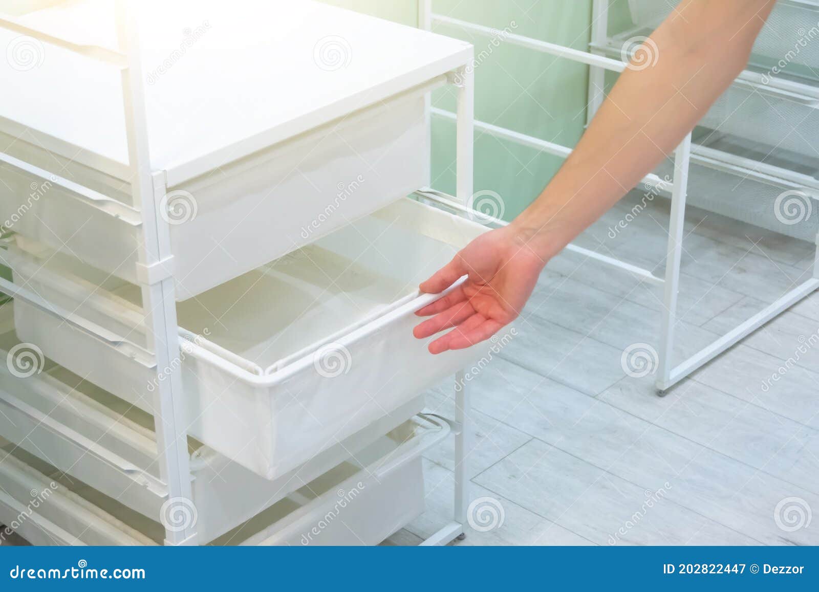 Opening a Drawer for Things, a Person`s Hand Opens the Empty Drawer ...