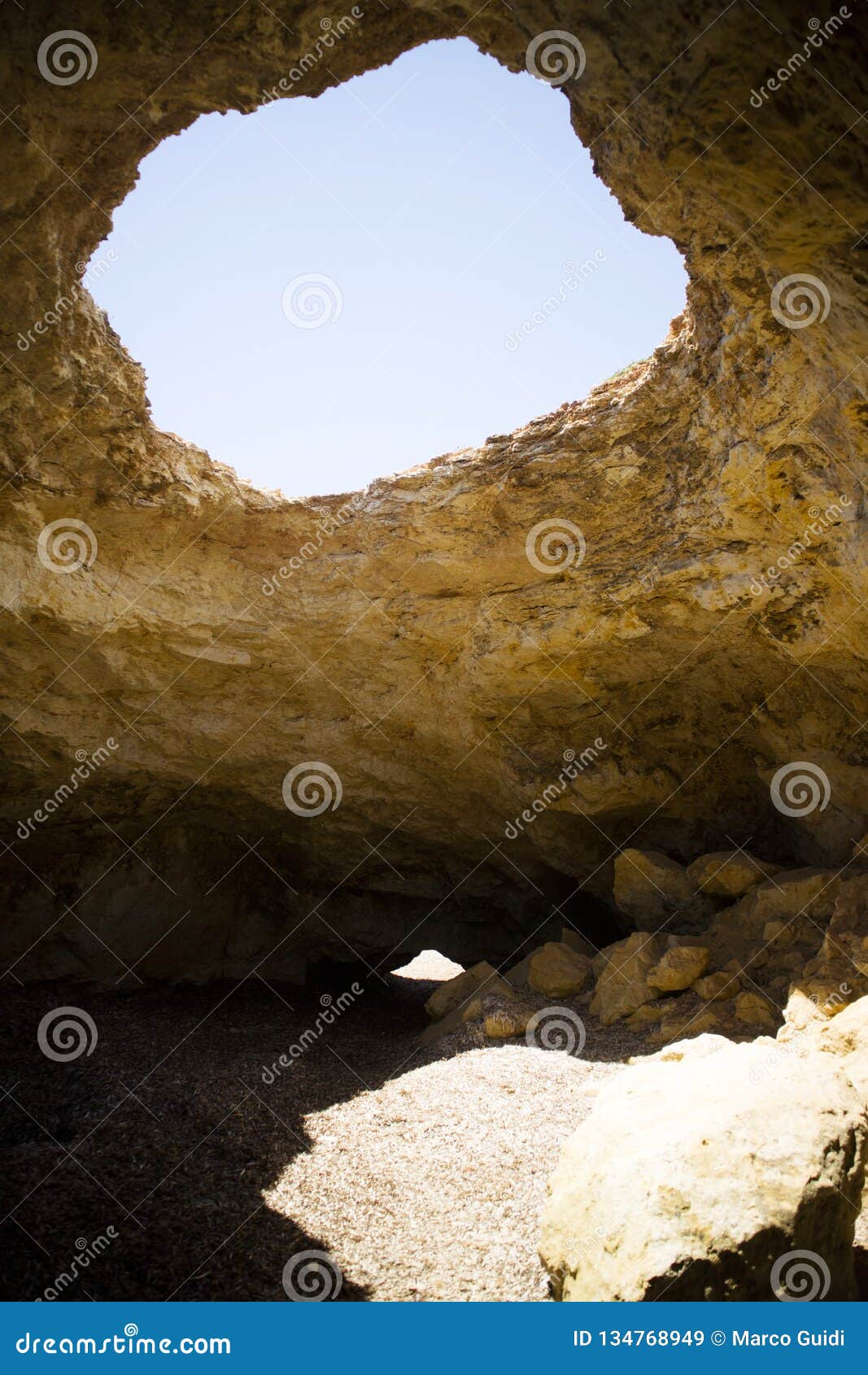 Opening of a natural cave stock image. Image of exploration - 134768949