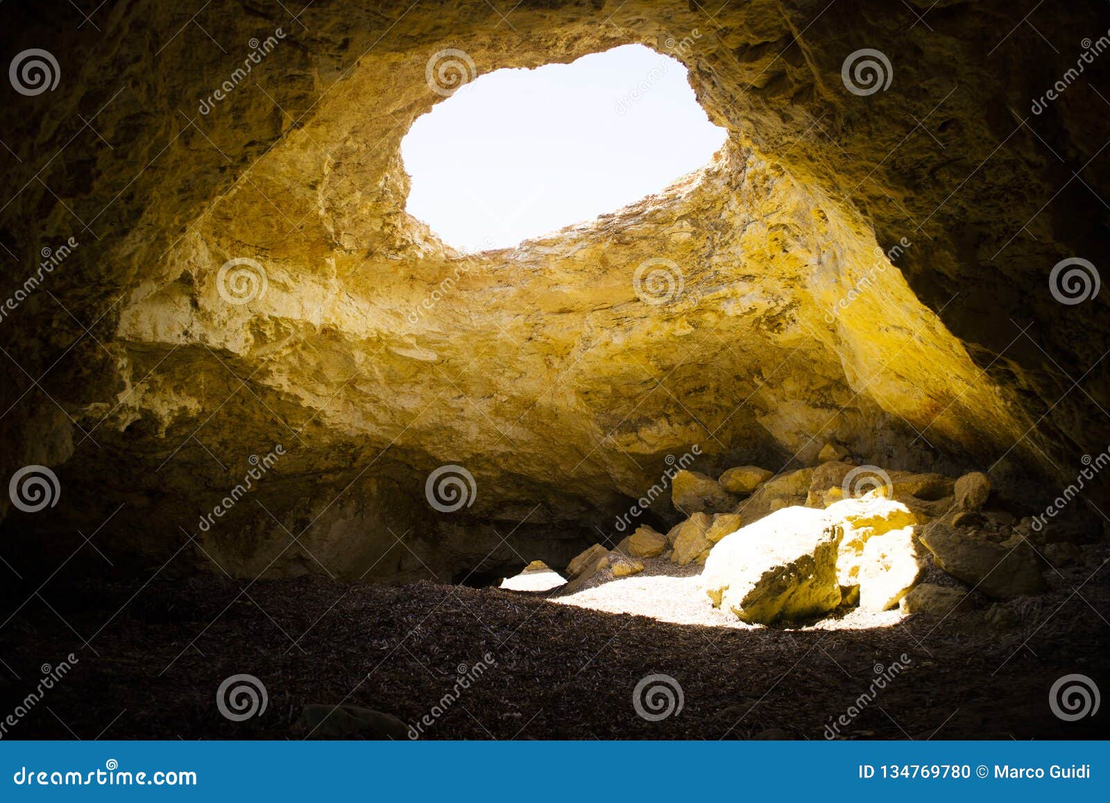 Opening of a natural cave stock photo. Image of adventure - 134769780