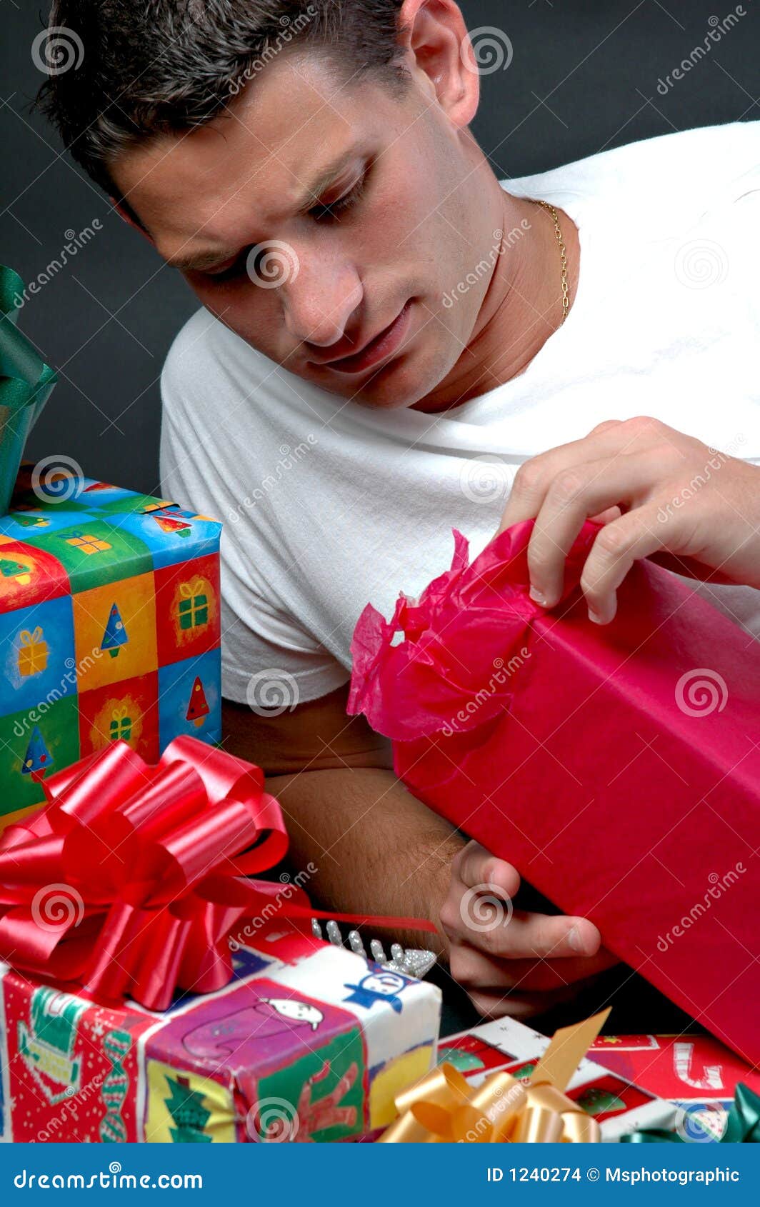 Opening Presents stock photo. Image of male, present, people - 1240274