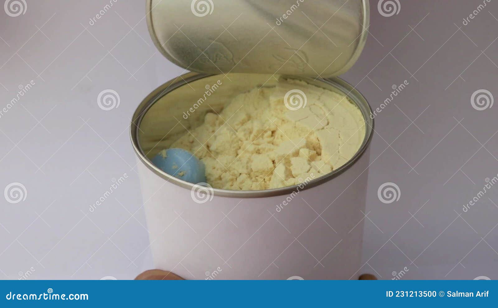 Opening the Sealed Lid of Powdered Milk Container. Stock Footage ...