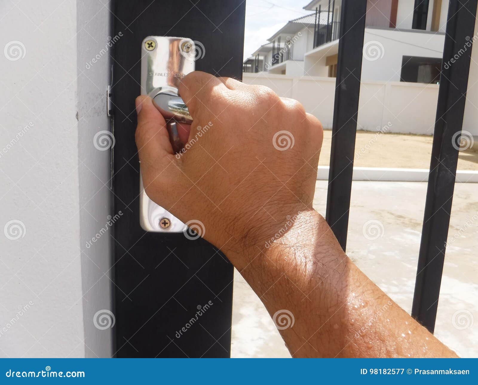 Opening the steel gate stock image. Image of entry, iron - 98182577