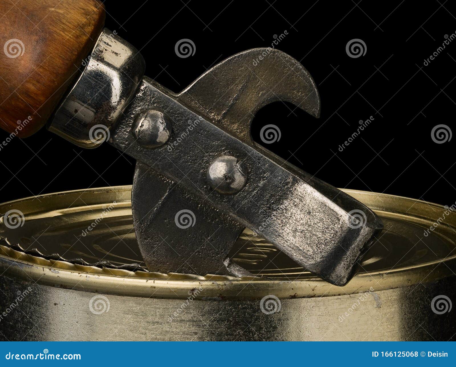 Opening of Tin Can by an Old Can Opener Stock Photo - Image of close ...