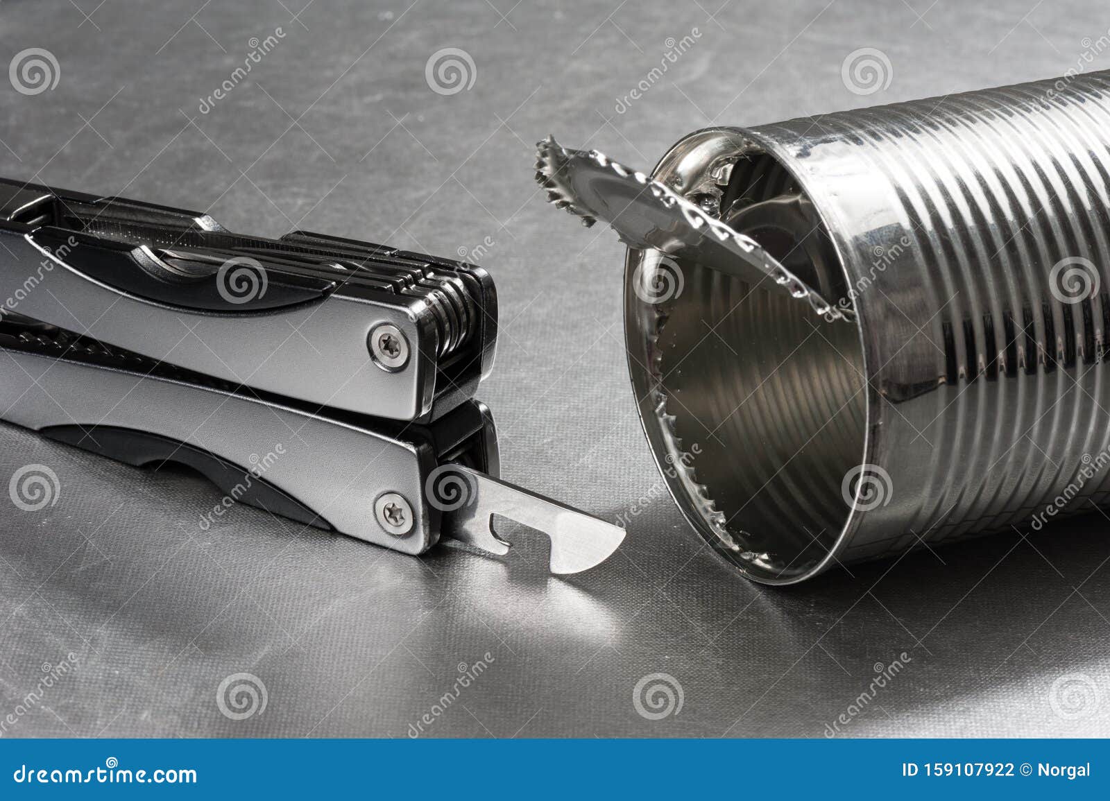 Opening the tin stock photo. Image of container, utensil - 159107922