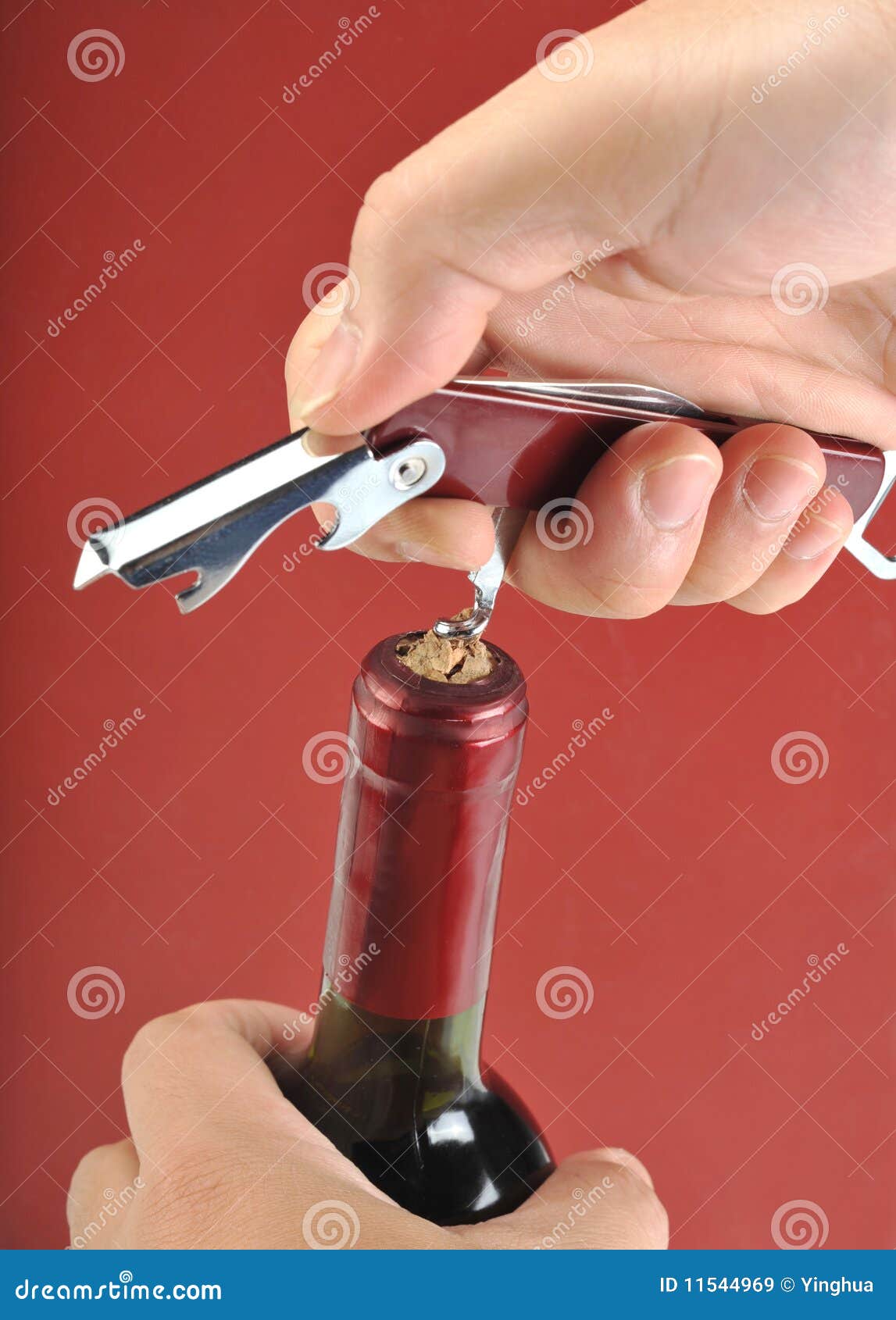 Opening a wine bottle stock image. Image of open, booze - 11544969