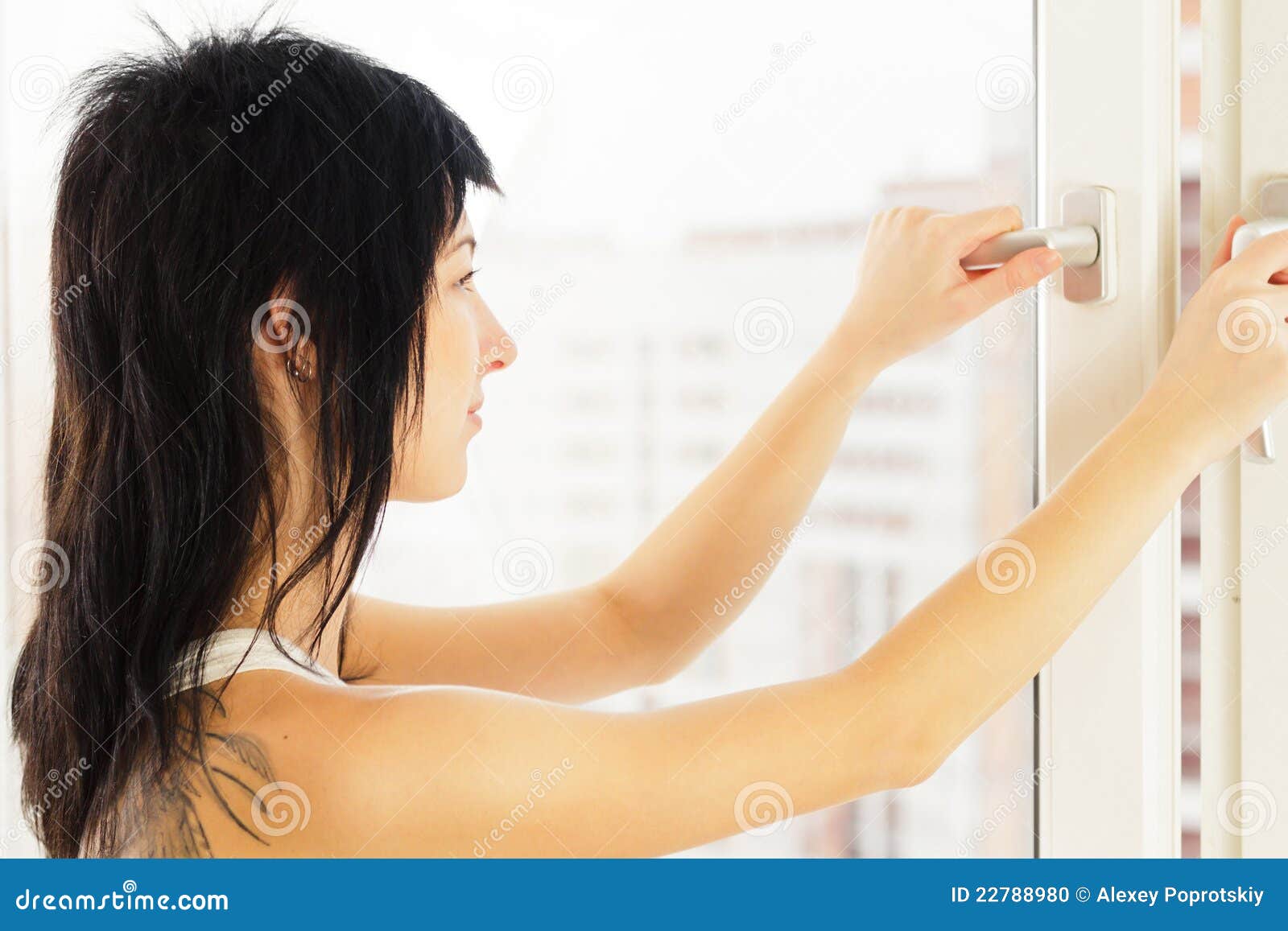 She opens a window stock photo. Image of adult, beauty - 22788980