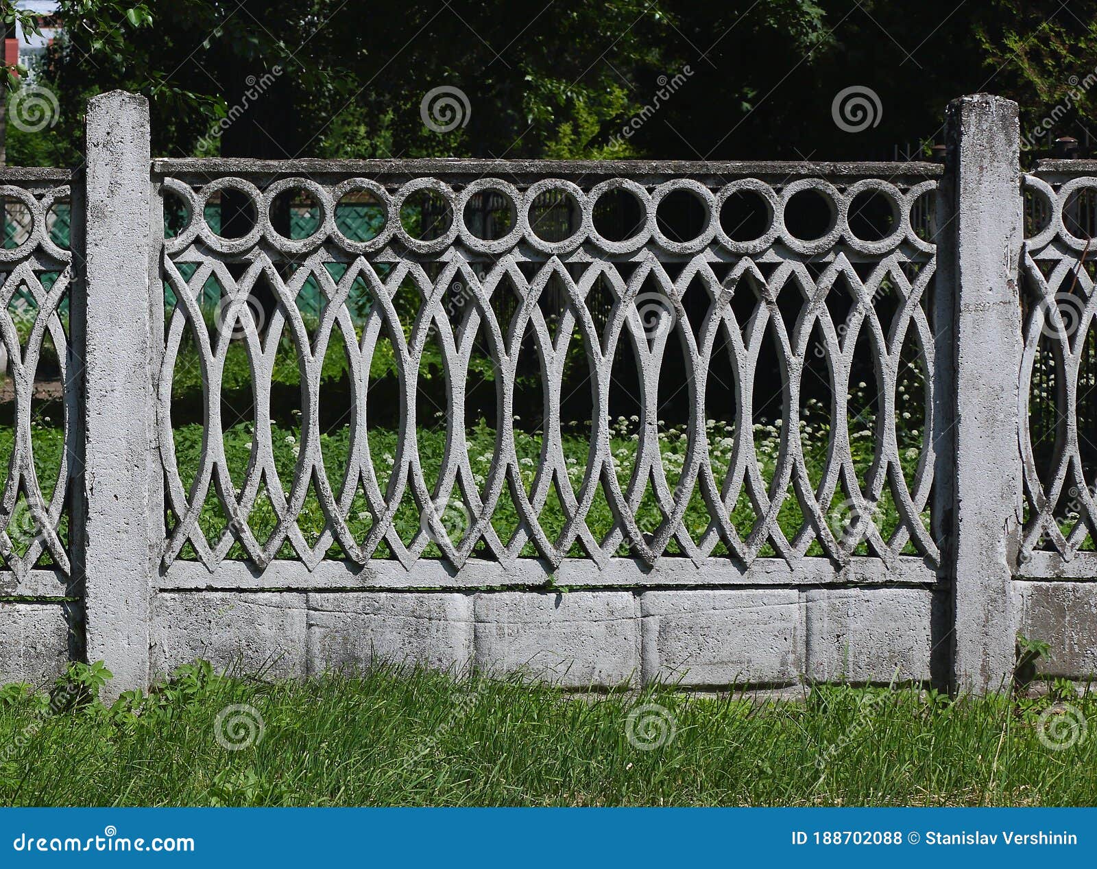 Openwork Concrete Fence of a Green Garden Stock Photo - Image of green ...