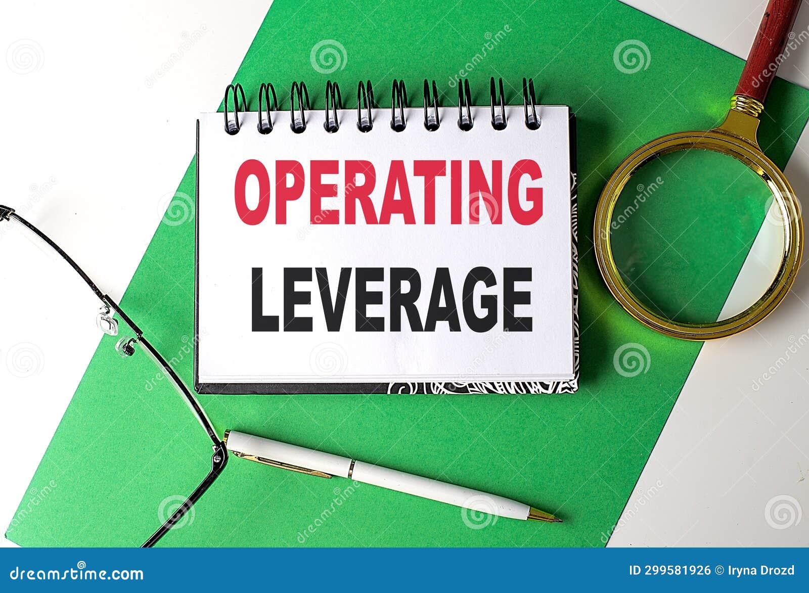 OPERATING LEVERAGE Text on Notebook on Green Paper Stock Photo - Image ...