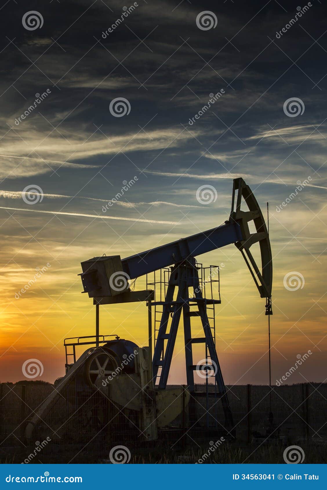 Operating Oil Well Profiled on Sunset Sky Stock Image - Image of ...