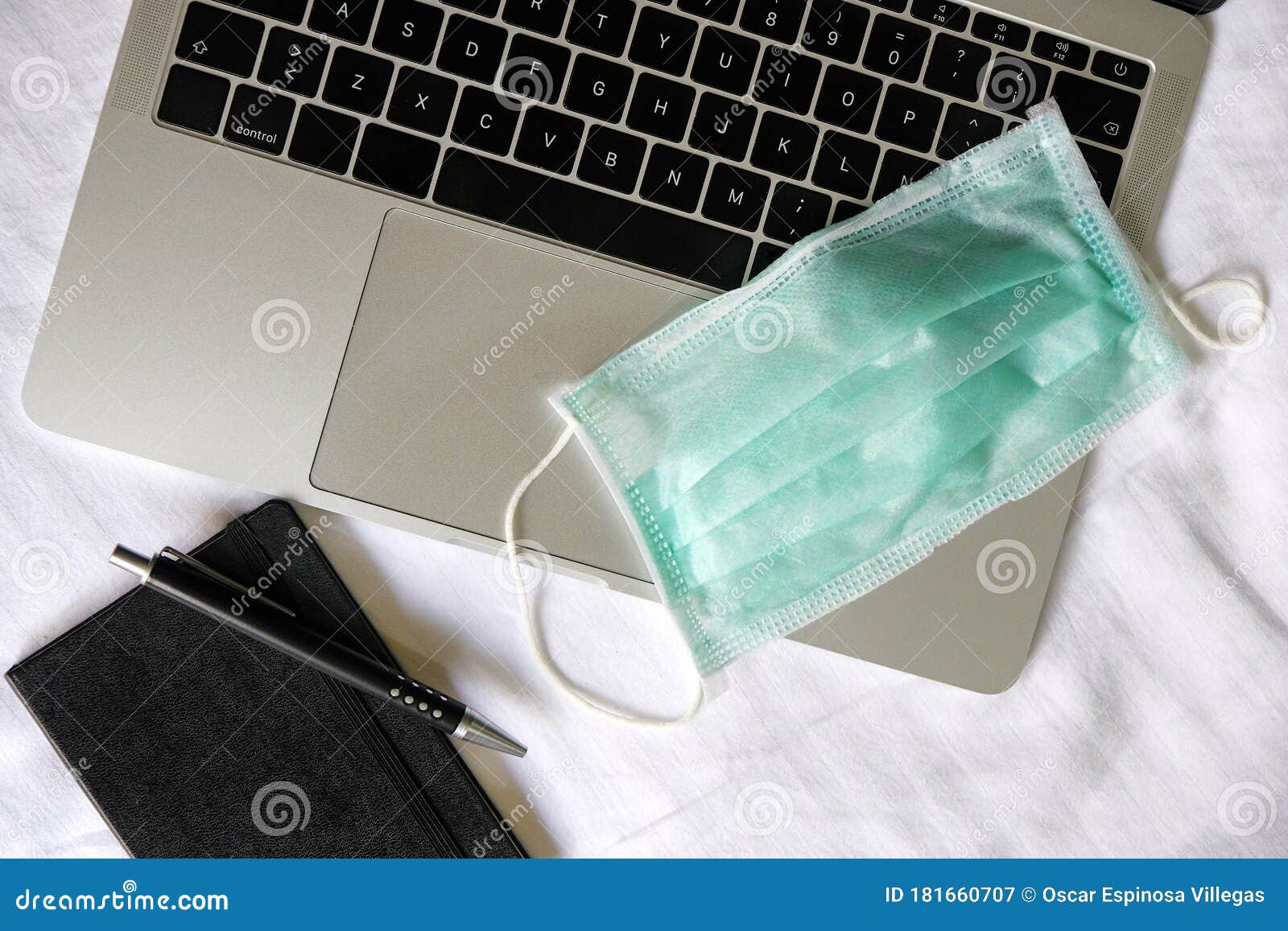 Mask on a laptop computer stock image. Image of work - 181660707