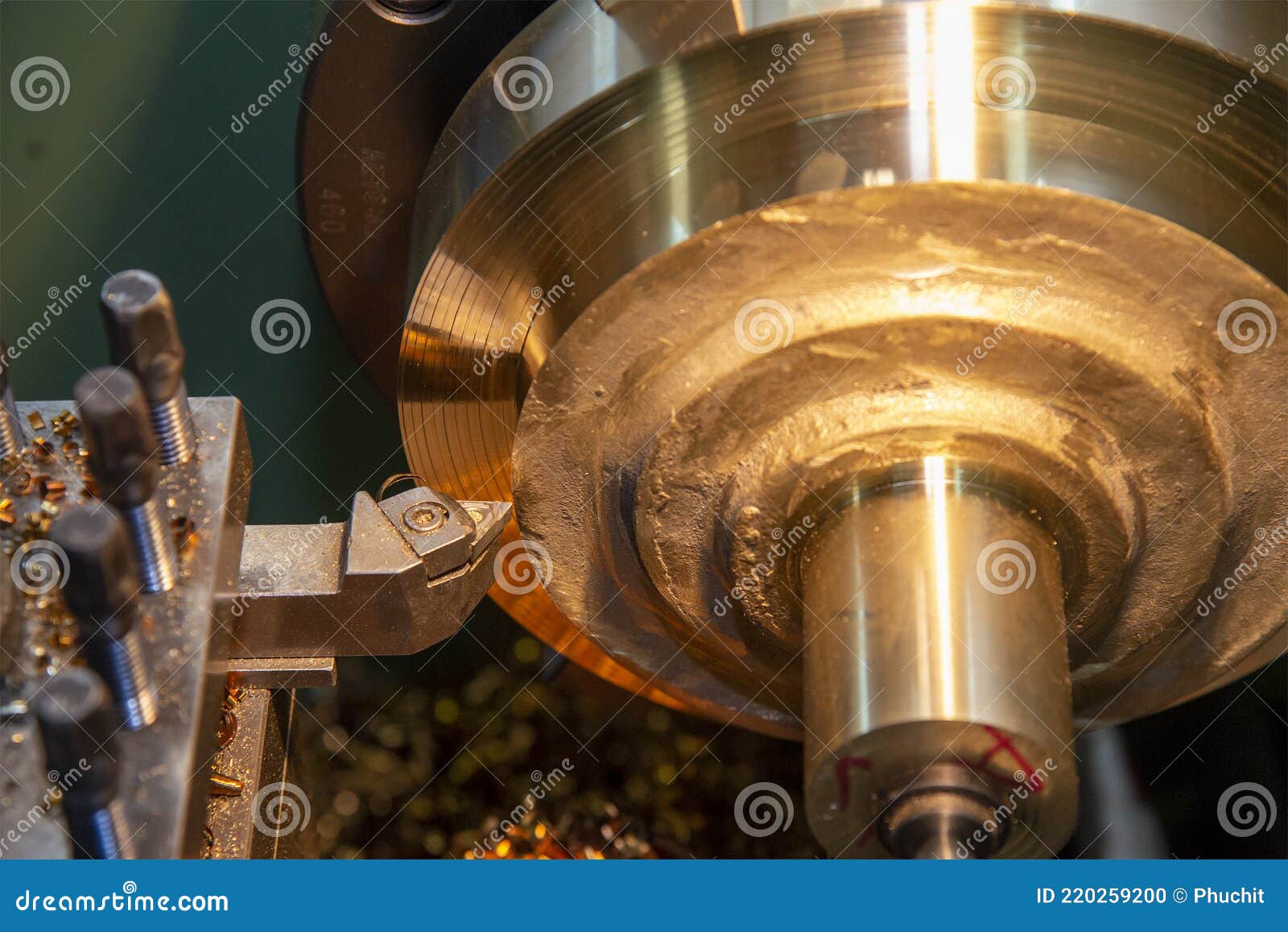 The Operation of Lathe Machine Cutting the Brass Shaft Material. Stock ...
