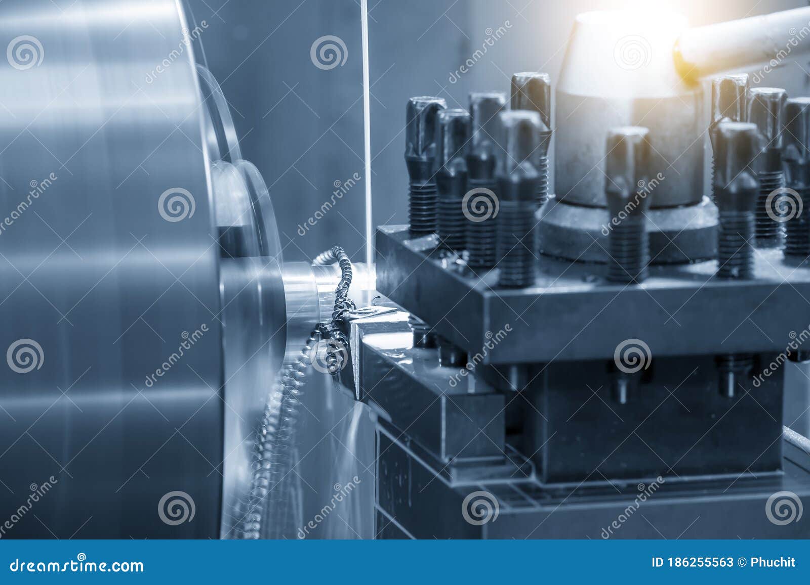 The Operation of Lathe Machine Cutting the Metal Parts with the Cutting ...
