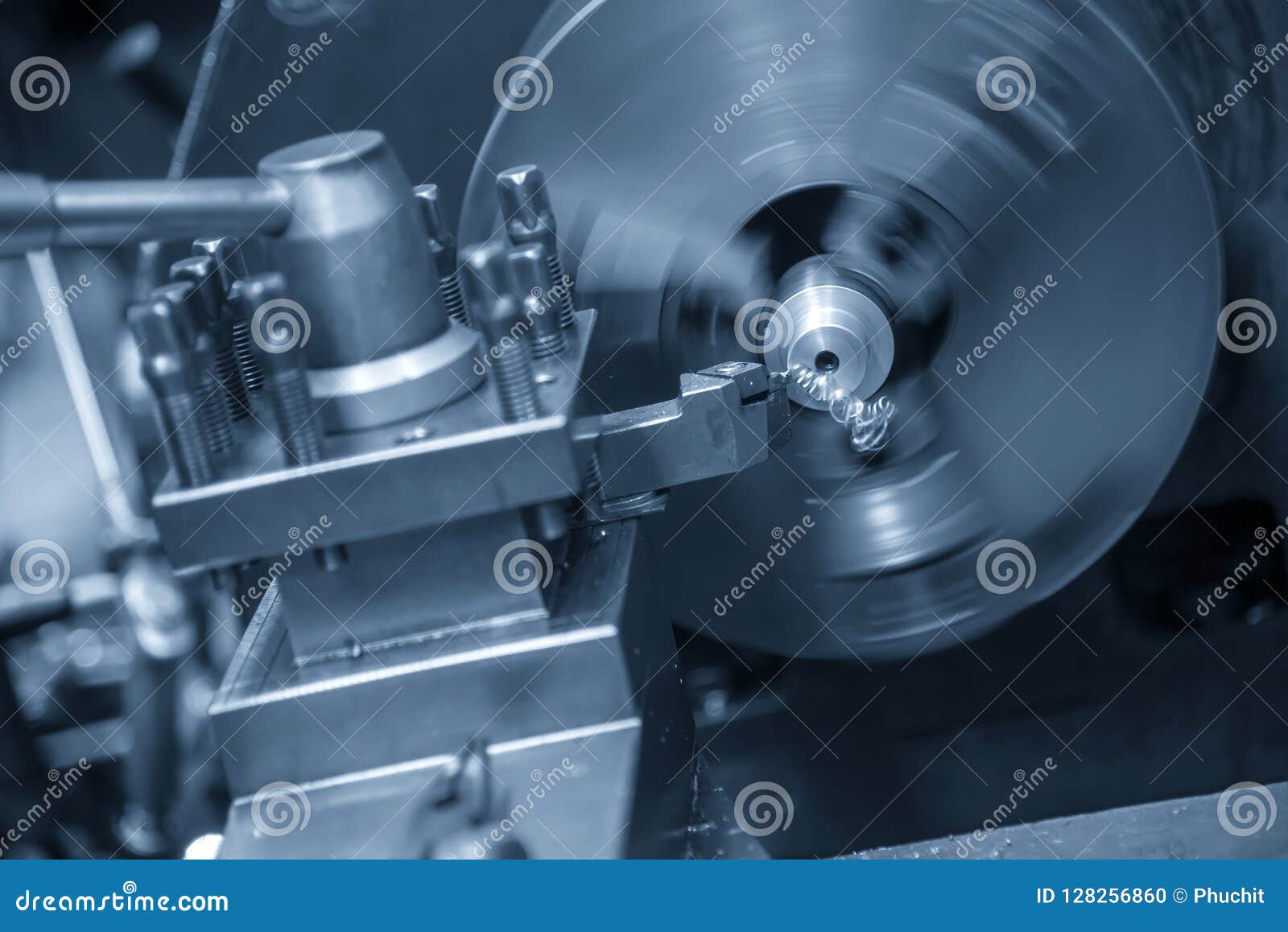 The Operation of Lathe Machine Cutting the Steel Shaft. Stock Photo ...