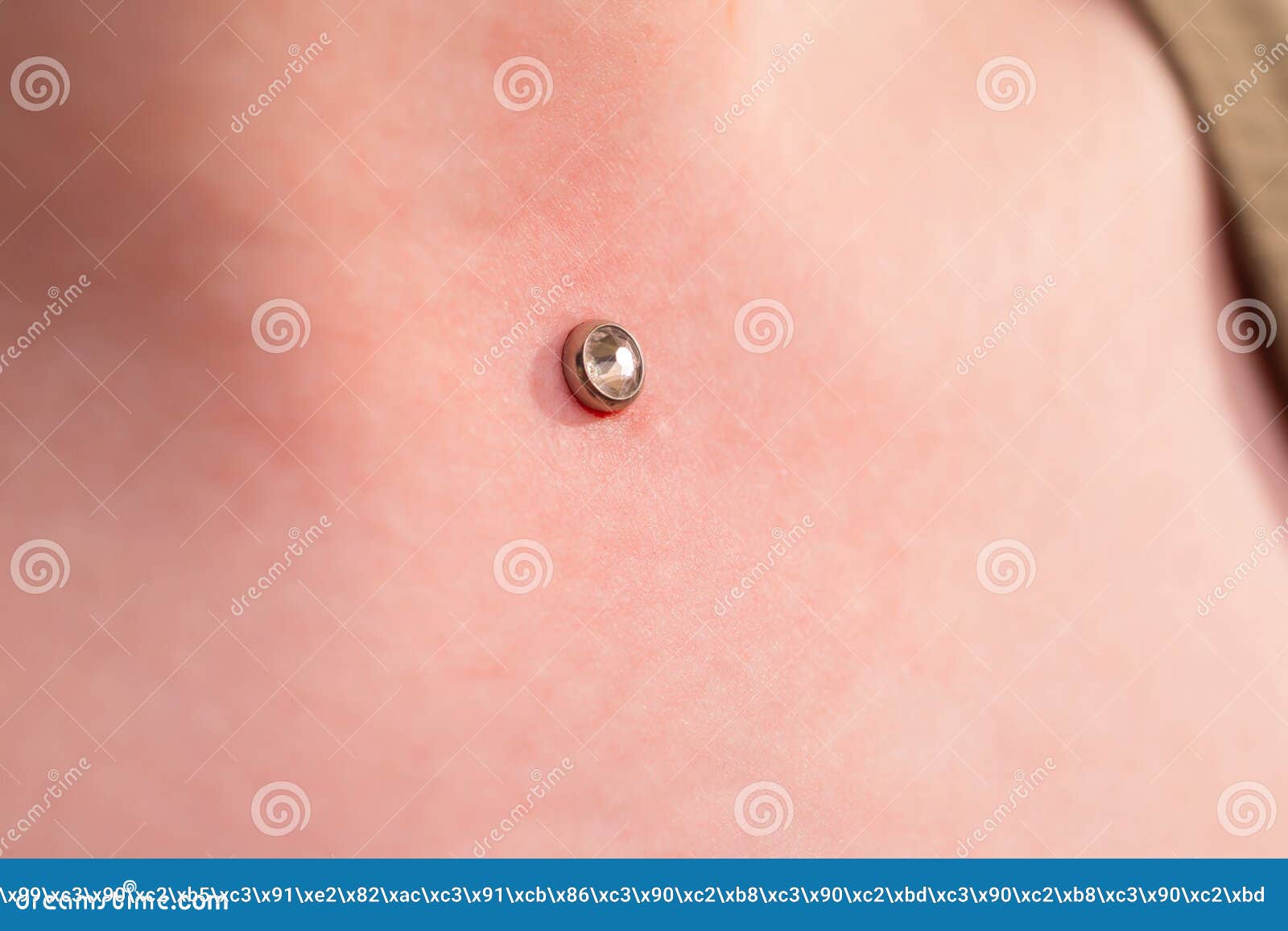 Operation To Install Microdermal Piercing. Professional Placing Stock ...