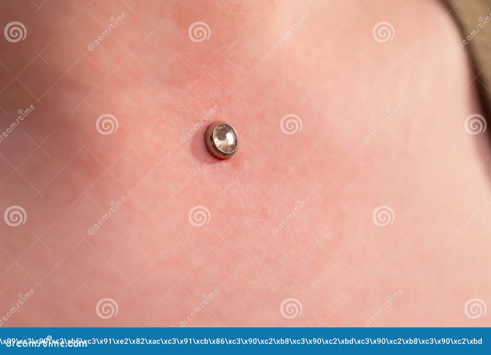 Operation To Install Microdermal Piercing. Professional Placing Stock ...