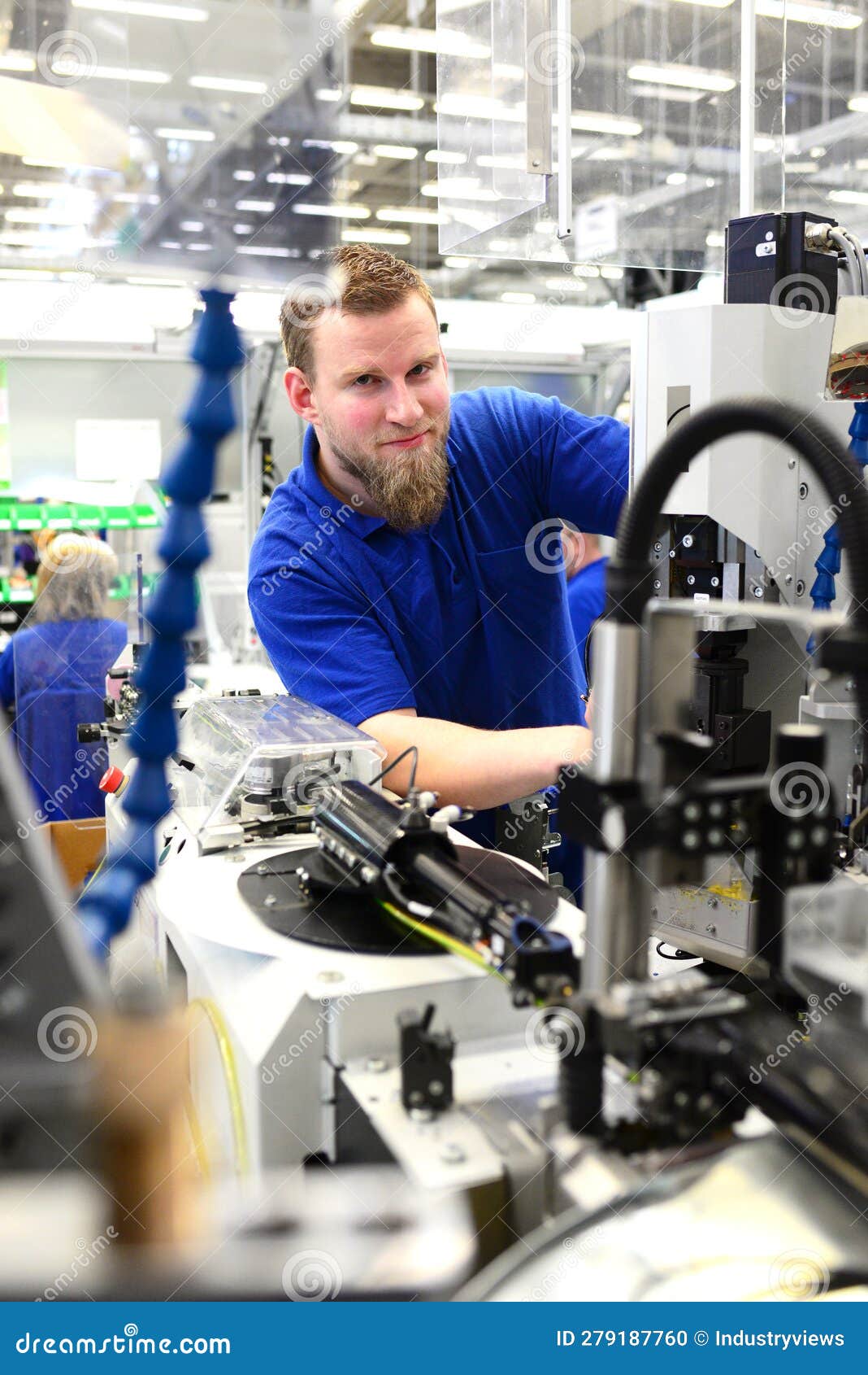 Operator Assembles Machine in a Factory - Production of Switch Cabinets ...