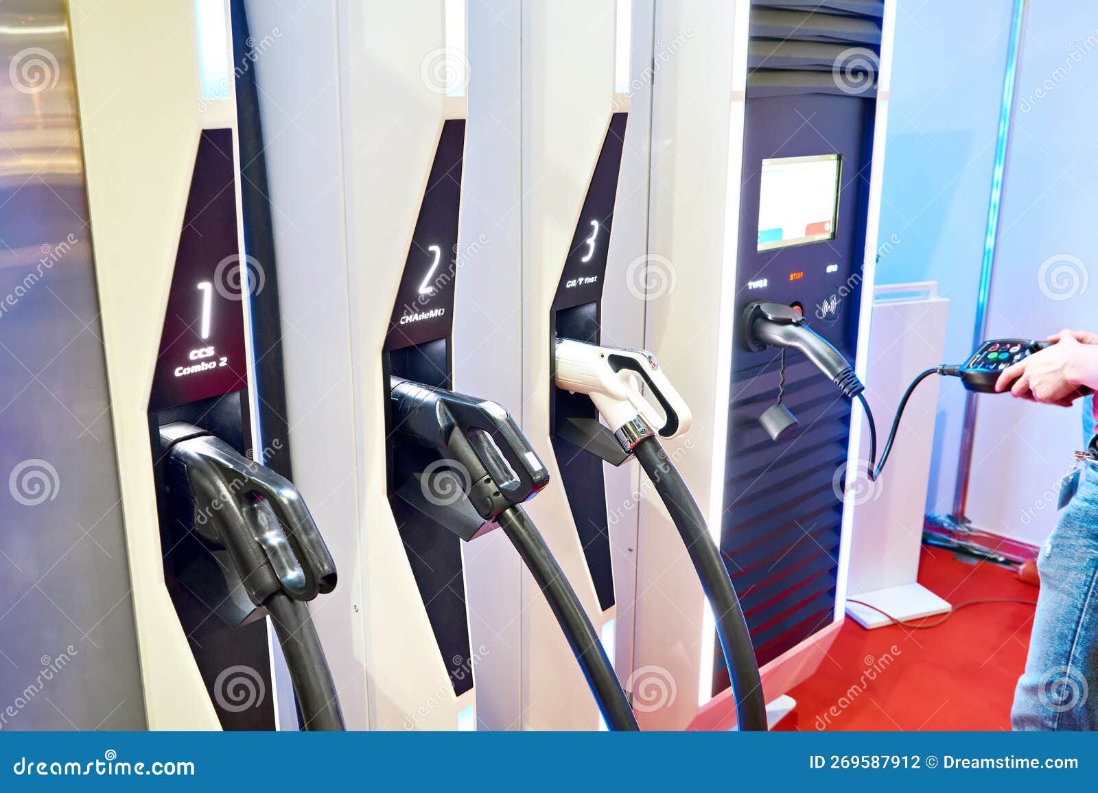 Operator and Charging Station for Electric Vehicles Stock Photo - Image ...