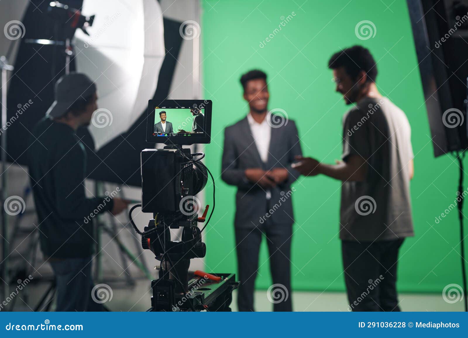 Operator Discussing Filming Process with Journalist Stock Photo - Image ...