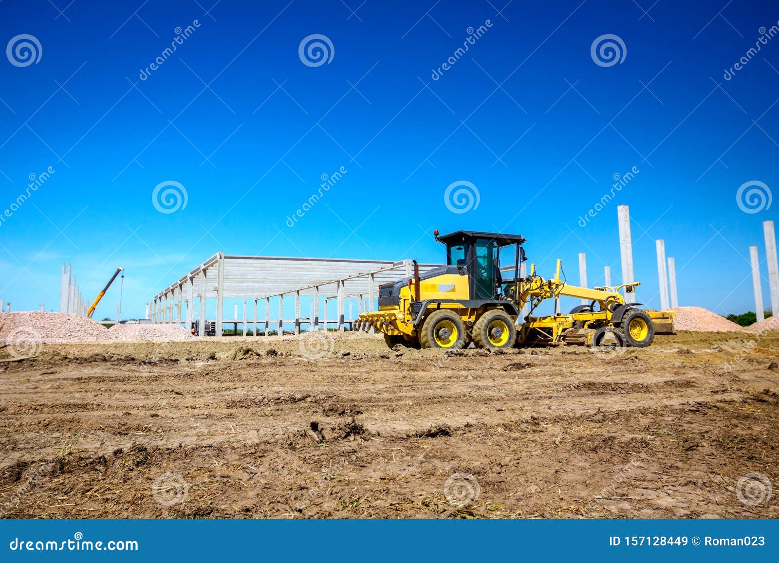 Grader is Leveling Ground at Construction Site Stock Image - Image of ...