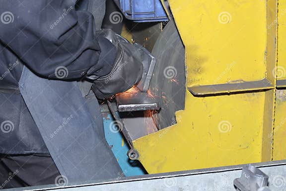 Operator grind workpiece stock photo. Image of grinding - 136564712