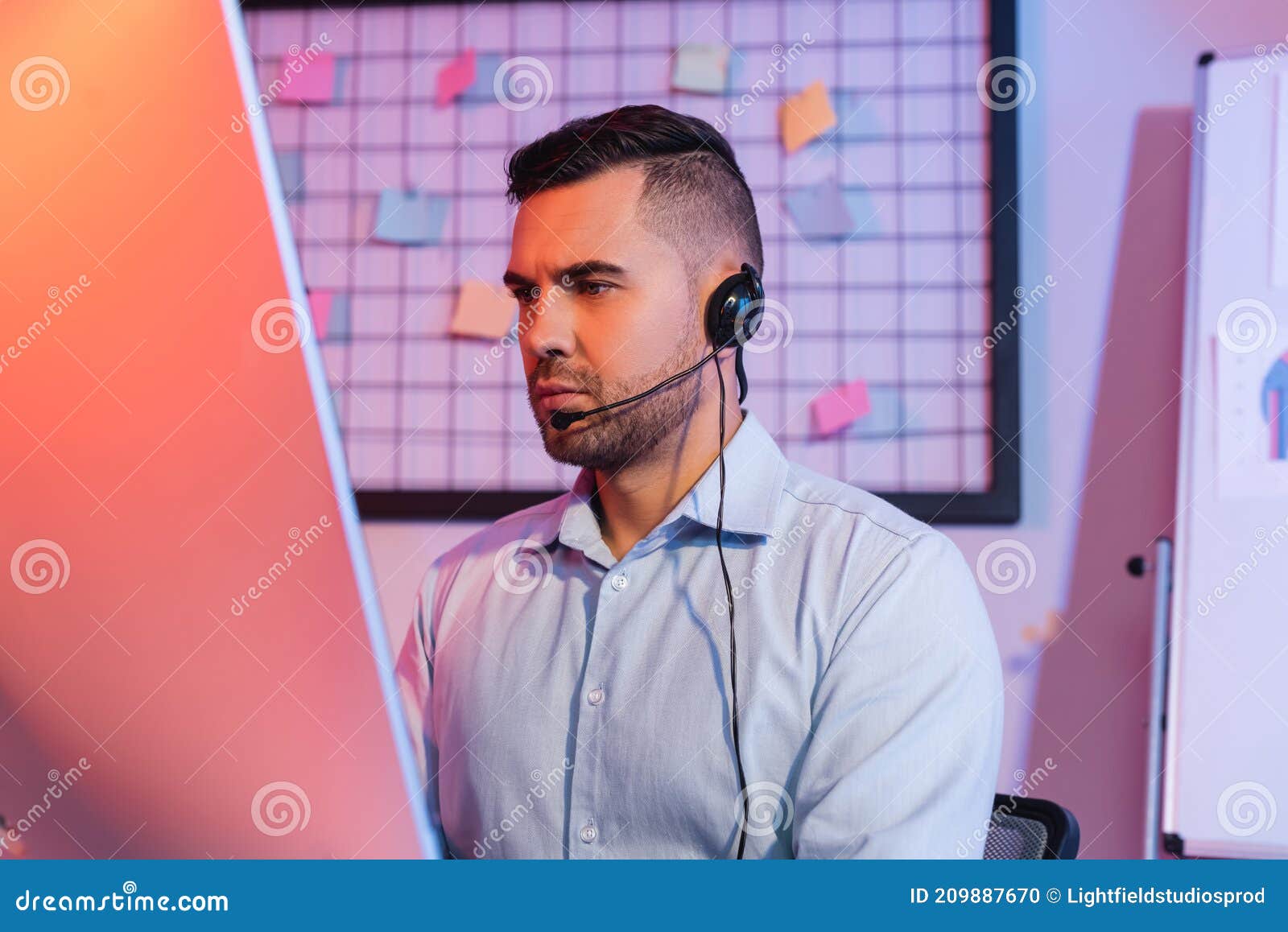 Operator in Headset Looking at Computer Stock Photo - Image of ...