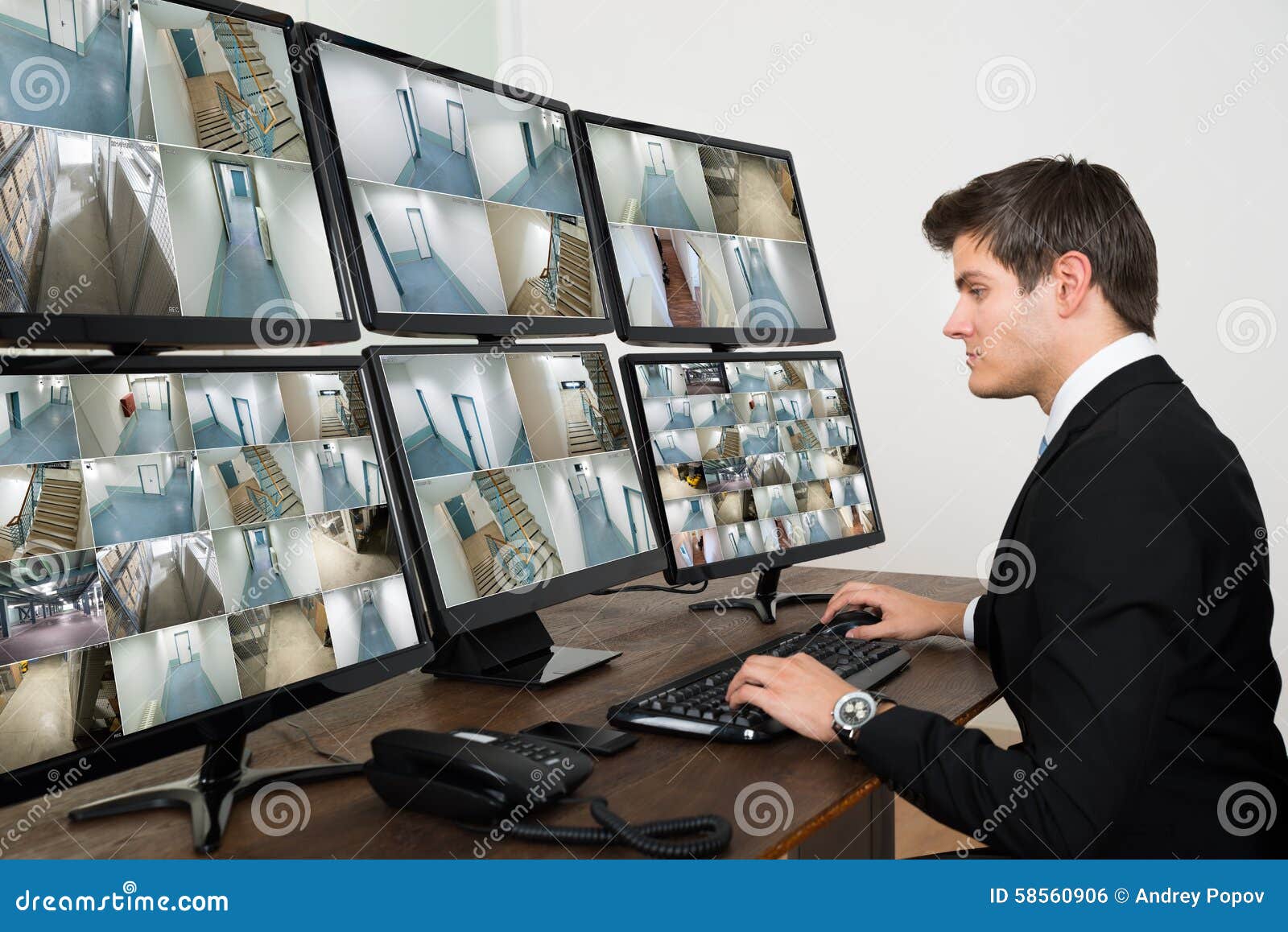 Operator Looking at Multiple Camera Footage Stock Photo - Image of ...