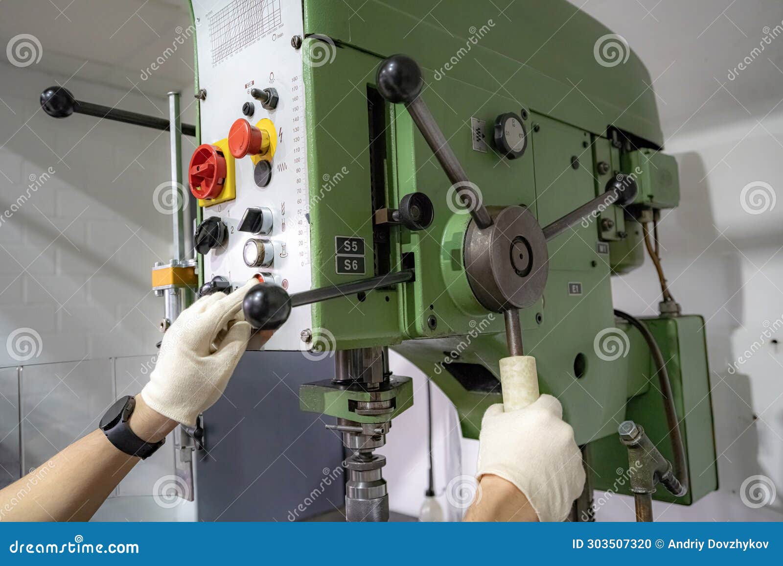 The Operator Operates a Mechanically Controlled Drilling Machine Stock ...