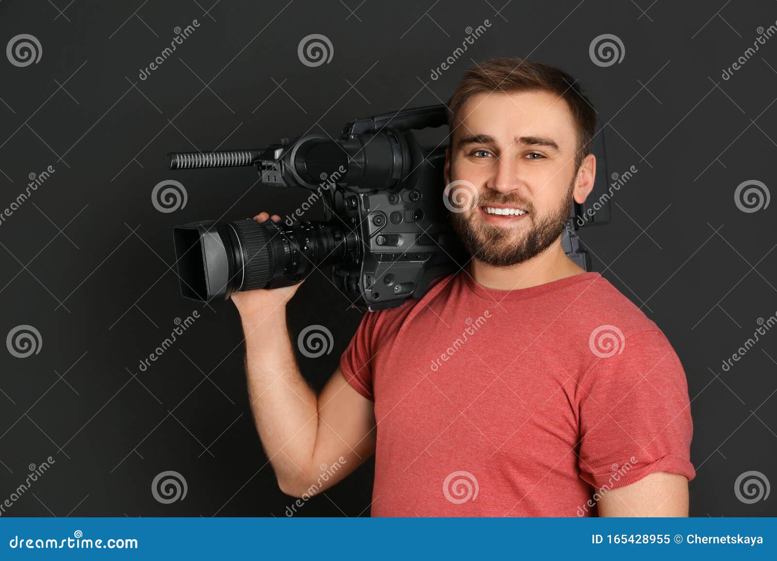 Operator with Professional Video Camera on Black Background Stock Image ...