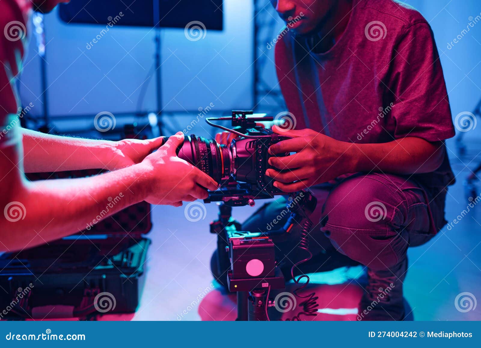 Operator Setting the Camera with His Assistant Stock Photo - Image of ...