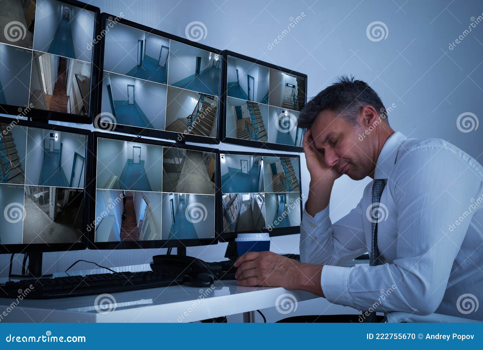 Operator Sleeping while Leaning on Desk Stock Photo - Image of record ...