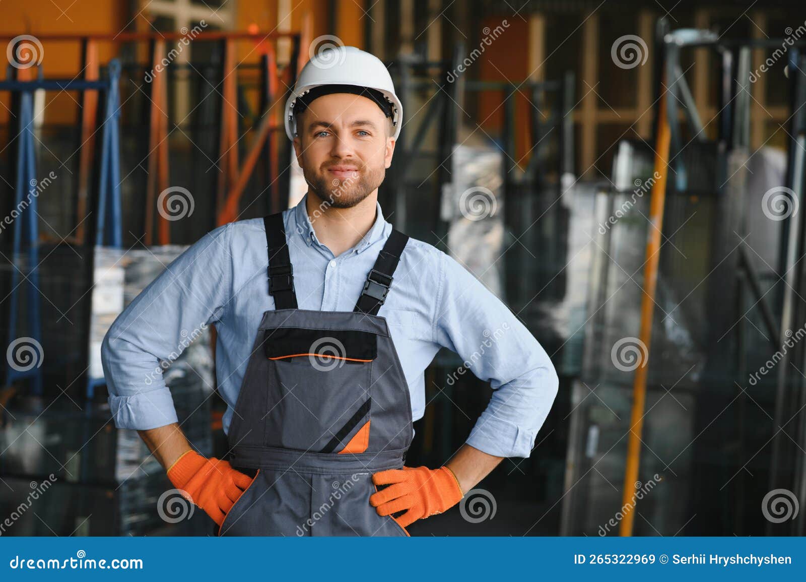 Operator Wearing Safety Hat Behind Control Panel on a Factory Stock ...