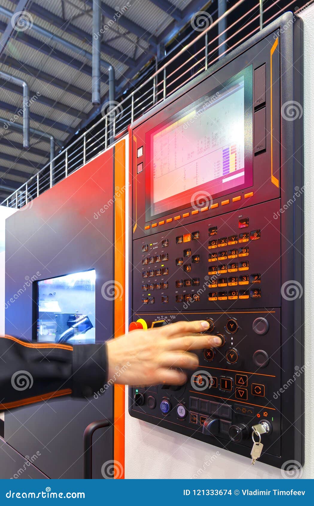 Operator Working with CNC Machining Center Using Control Panel ...