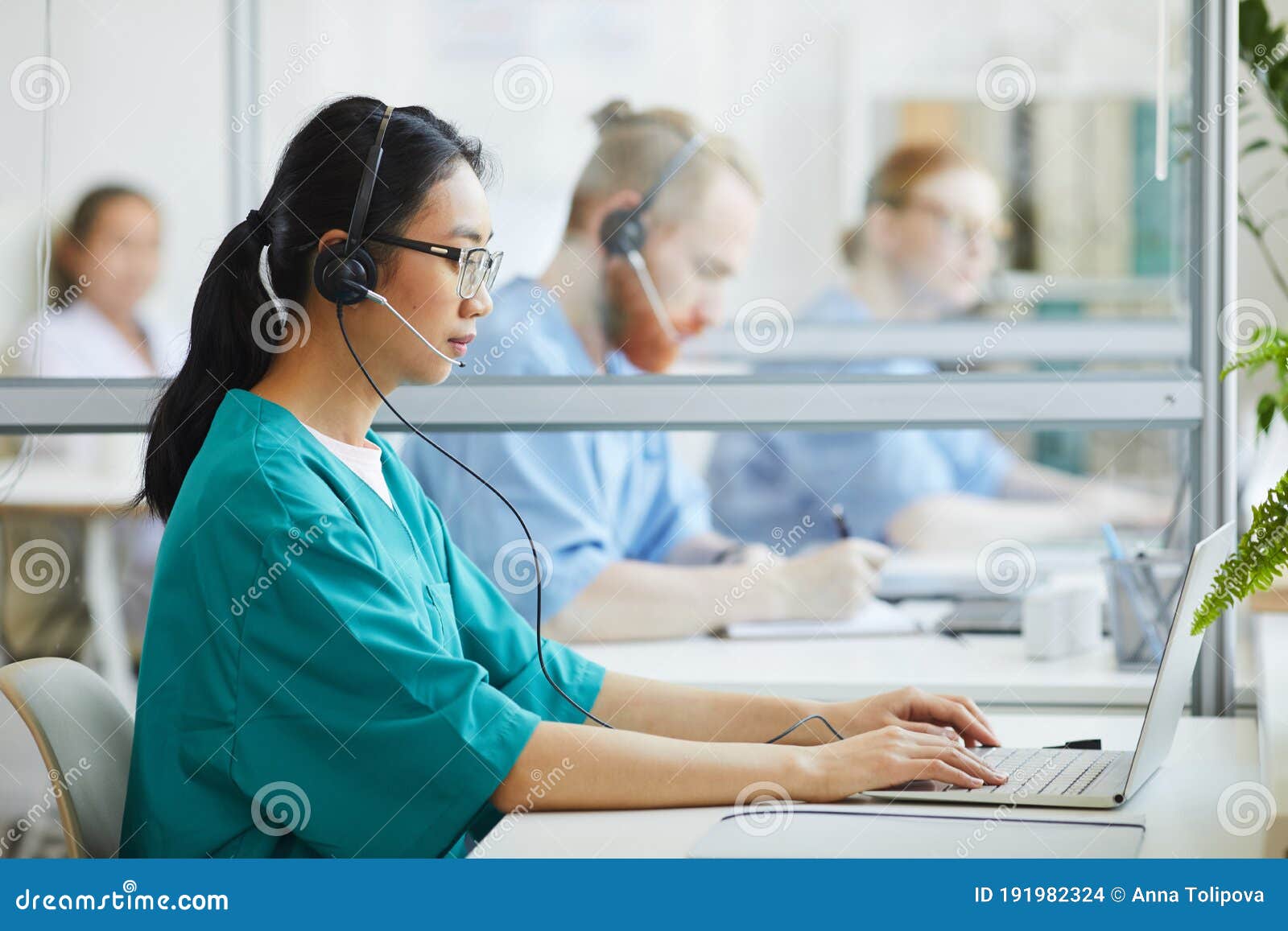Operator Working at Hospital Stock Photo - Image of talking, confidence ...