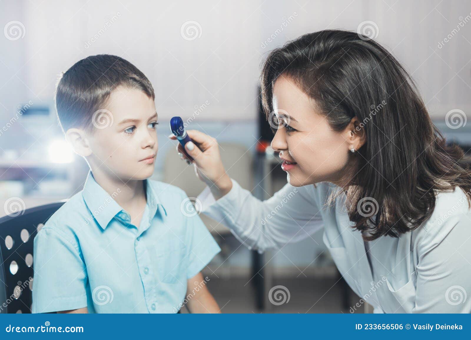 Ophthalmologist Checks the Boy`s Vision. Vision Tests in Children ...